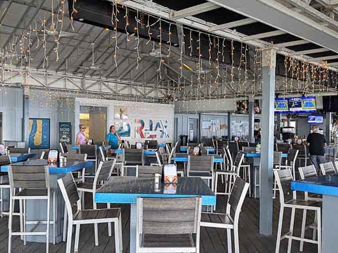 Open-air dining with ocean breezes and racing memorabilia creates the perfect Florida fusion of speed and serenity.