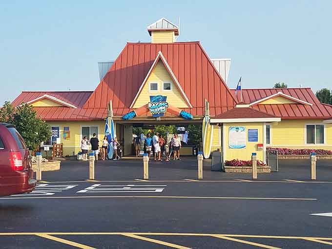 That cheerful yellow entrance is your gateway to the best day you'll have all summer long.