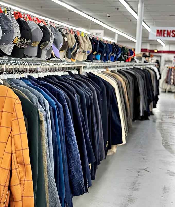 Rows of jackets and caps stretching into infinity, like a rainbow made entirely of second chances.
