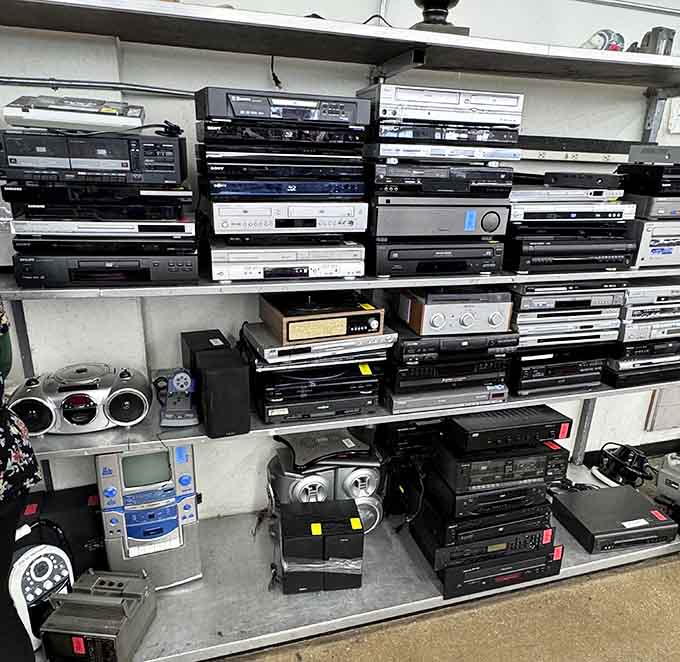 A wall of vintage stereos that would make any audiophile weep with joy and nostalgia combined.