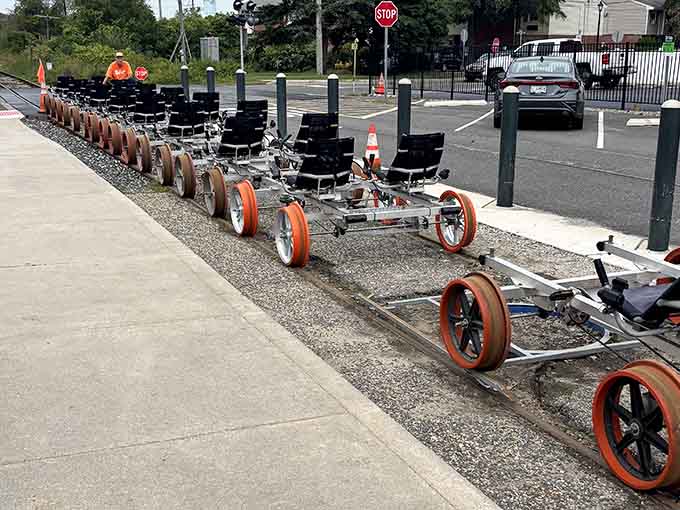 These orange-wheeled wonders line up like eager students on field trip day, ready for adventure.