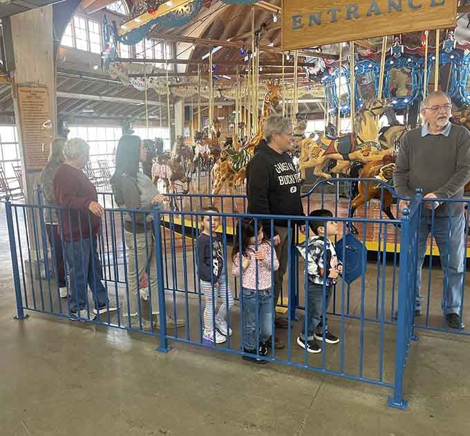 Three generations waiting to board proves that some thrills don't need loops or drops, just polished brass poles.