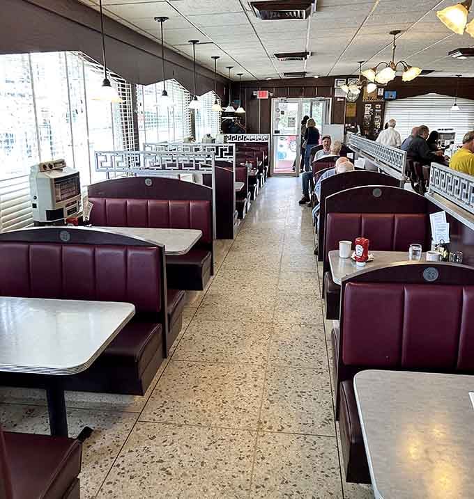 Burgundy booths and terrazzo floors create the perfect stage for breakfast, lunch, or dinner done absolutely right.