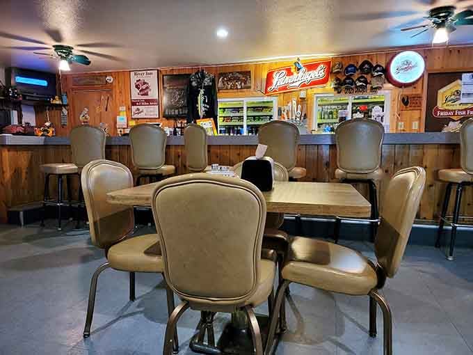 Classic Wisconsin tavern vibes with wood paneling and Leinenkugel's signs, this is where comfort meets community perfectly.
