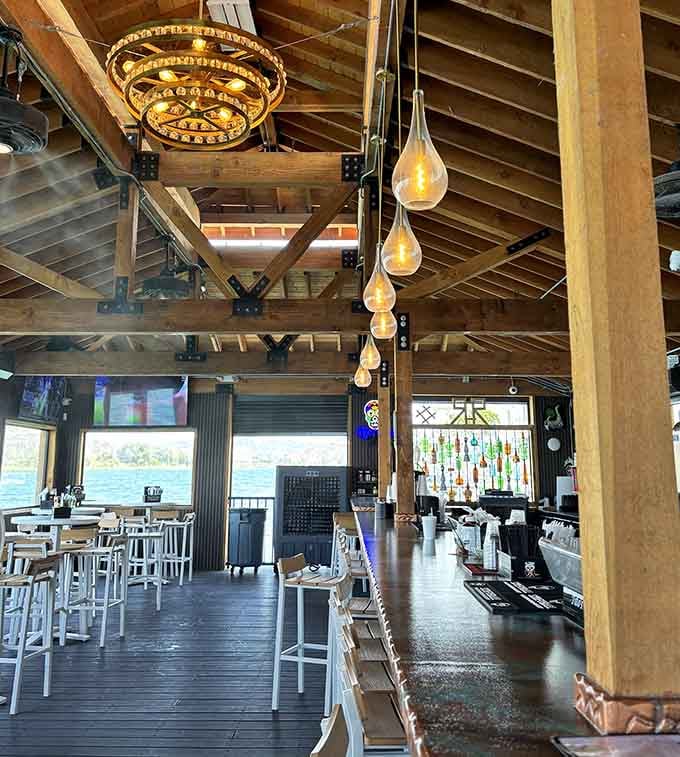 Exposed beams and pendant lights create an atmosphere that's equal parts rustic charm and waterfront sophistication.