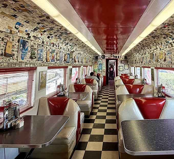 Red vinyl booths, checkered floors, and memorabilia covering every inch create the ultimate time-traveling dining experience.