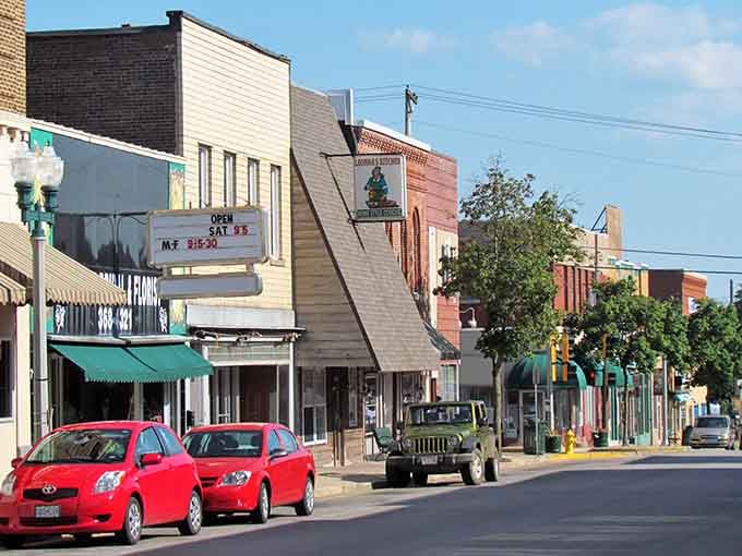 Classic storefronts and vintage marquees line streets where small-town charm meets genuine community character beautifully.
