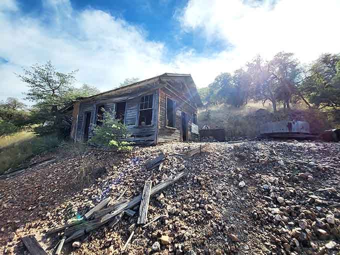 Sunlight streams through broken windows where families once lived, creating an eerie beauty that's pure photographer's gold.