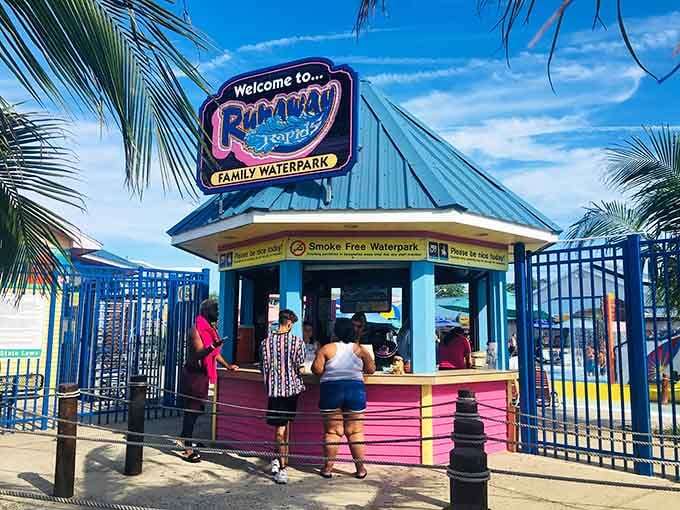 That cheerful entrance promising a smoke-free zone of pure summer joy just beyond those colorful gates ahead.