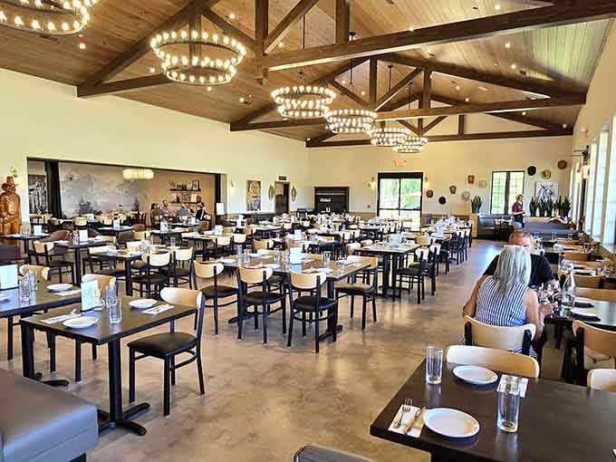 Those soaring ceilings and statement chandeliers create an atmosphere that's equal parts rustic charm and contemporary elegance&mdash;Joanna Gaines would approve.