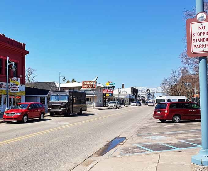 Downtown streets where vintage neon signs still glow and nobody's in a hurry to tear them down.