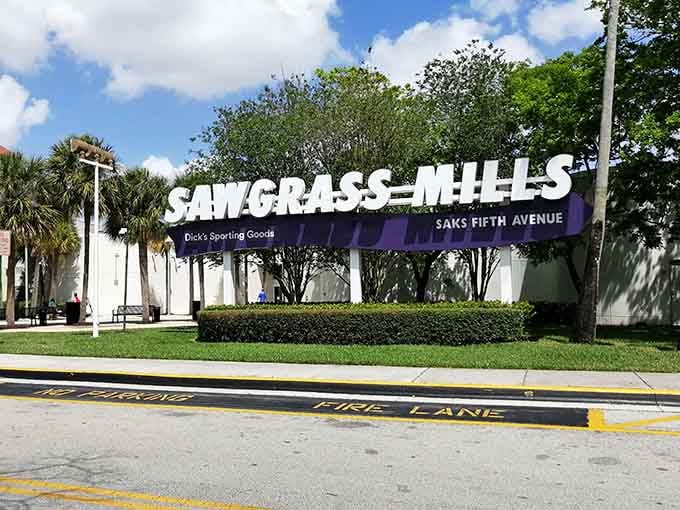 Bold letters announce your arrival at America's largest outlet mall, where palm trees meet premium deals in perfect harmony.