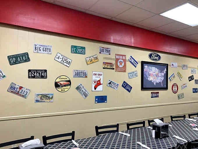 License plates from across America adorn the walls, proof that great barbecue attracts fans from everywhere.