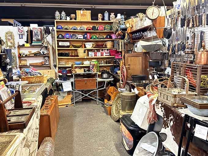 Step inside where vintage treasures stack floor to ceiling like an antique lover's fever dream come true.