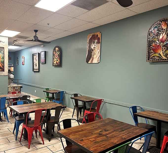 Colorful chairs, warm walls, and artwork that makes you smile before the first bite even arrives at your table.