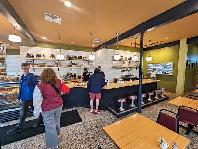 Clean lines, classic stools, and a counter where sandwich dreams become delicious reality every single day.