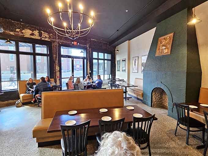 Step inside where exposed brick and contemporary design create an atmosphere that's equal parts sophisticated steakhouse and welcoming neighborhood gathering spot.