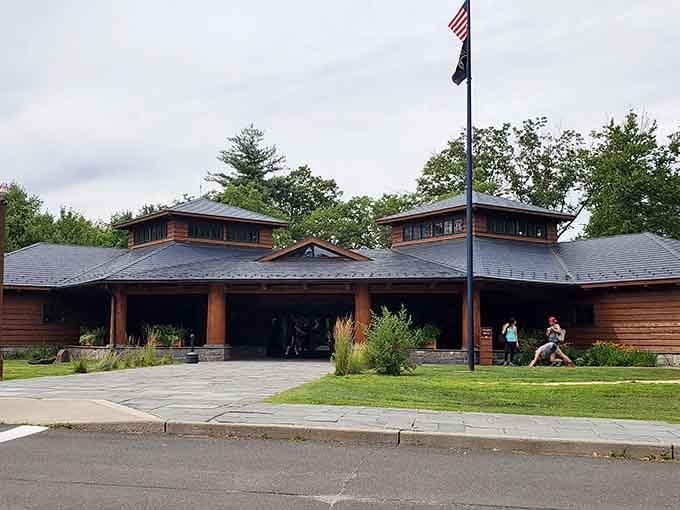 The visitor center welcomes you with rustic charm and helpful rangers who actually enjoy their jobs, imagine that.