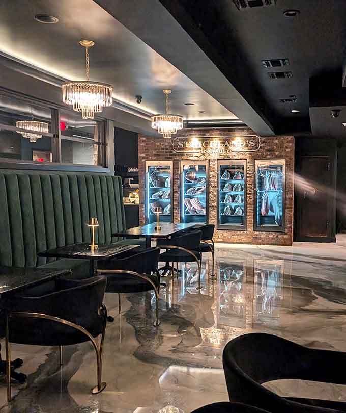 Crystal chandeliers and emerald booths create an atmosphere where elegance meets comfort in the most delicious way possible.