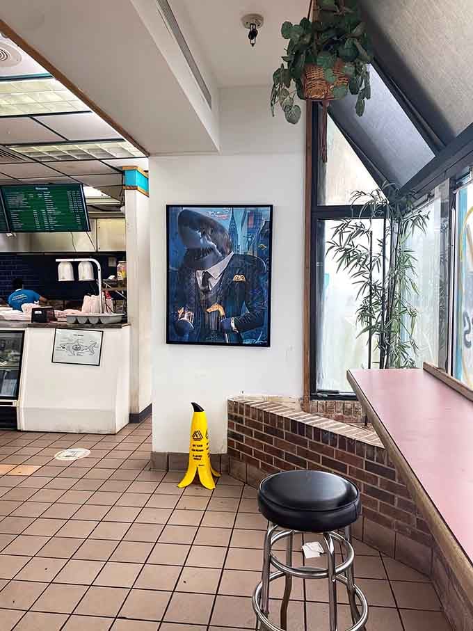 Simple booths, clean lines, and a menu board promising fried perfection. Sometimes less really is more.