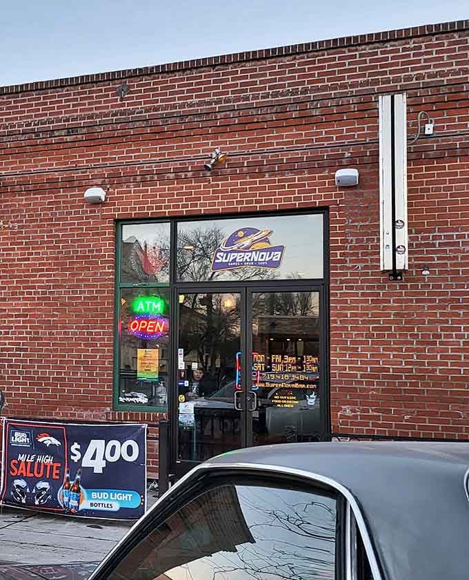 That unassuming brick exterior hides a treasure trove of pixelated memories and perfectly poured pints inside.