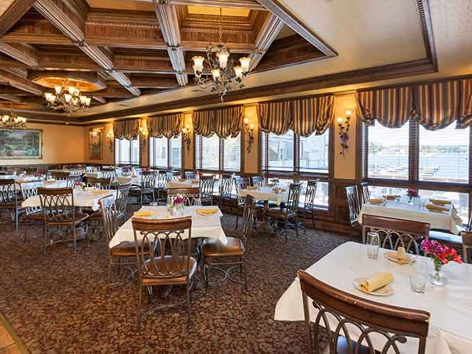 Windows overlooking Stone Lake turn every meal into dinner theater, courtesy of Mother Nature herself.