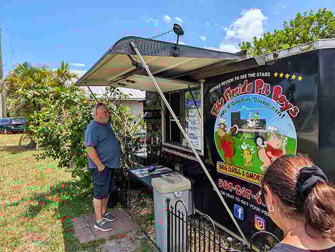 The ordering window where dreams of perfectly smoked meat become delicious, sauce-covered reality for lucky customers.
