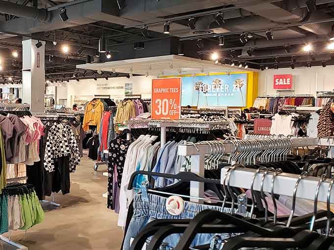 Racks on racks of possibilities, organized like a rainbow decided to become a wardrobe consultant for your closet.