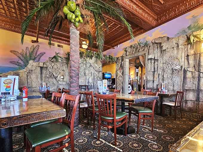Palm trees meet ancient ruins in a dining room that somehow makes perfect sense once you taste the food.