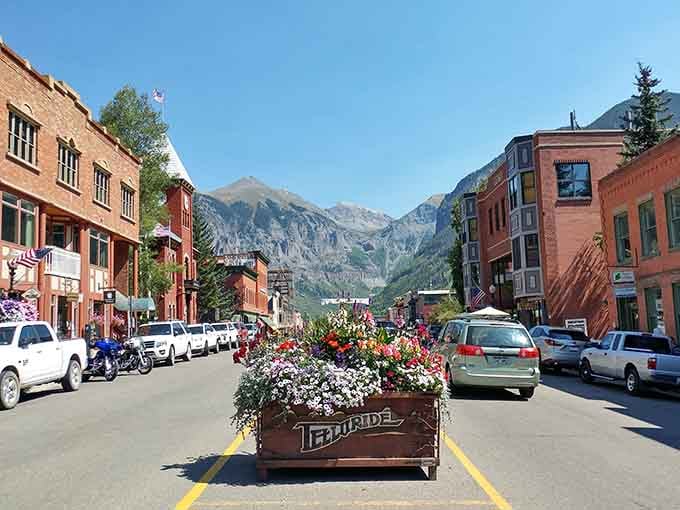 Flower boxes overflowing with color because apparently Telluride decided regular beauty wasn't quite enough.