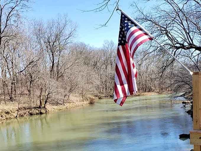 That American flag waving over Terrapin Creek isn't just patriotic, it's marking your gateway to paddling paradise.