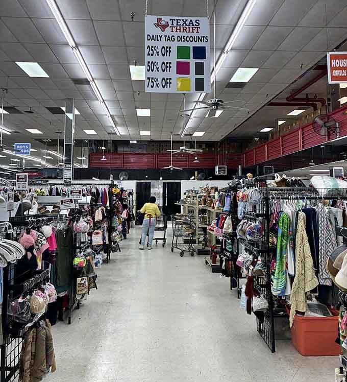 Aisles stretch endlessly like a secondhand Narnia, organized chaos at its absolute finest for serious bargain hunters.