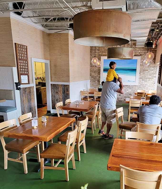 Notice that green flooring? It's like walking on a putting green that leads to paradise instead of par.