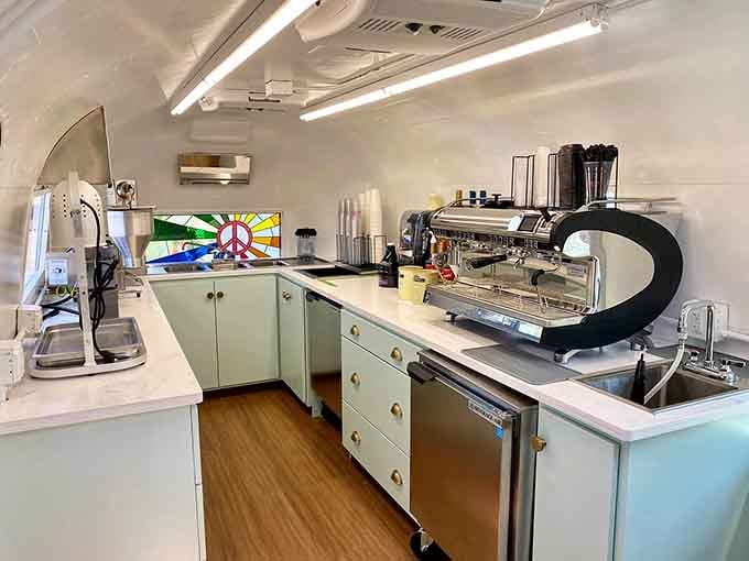 Inside this aluminum wonder, mint green cabinets and professional espresso equipment prove good things really do come in small packages.