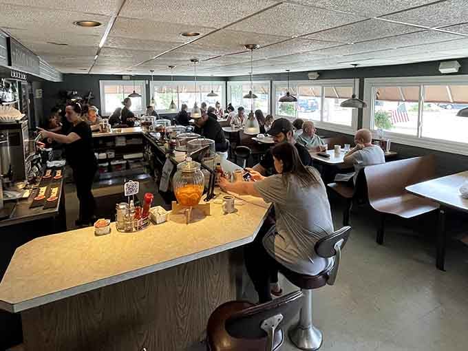 Inside, booths and counter stools create the perfect democratic breakfast society we all need.