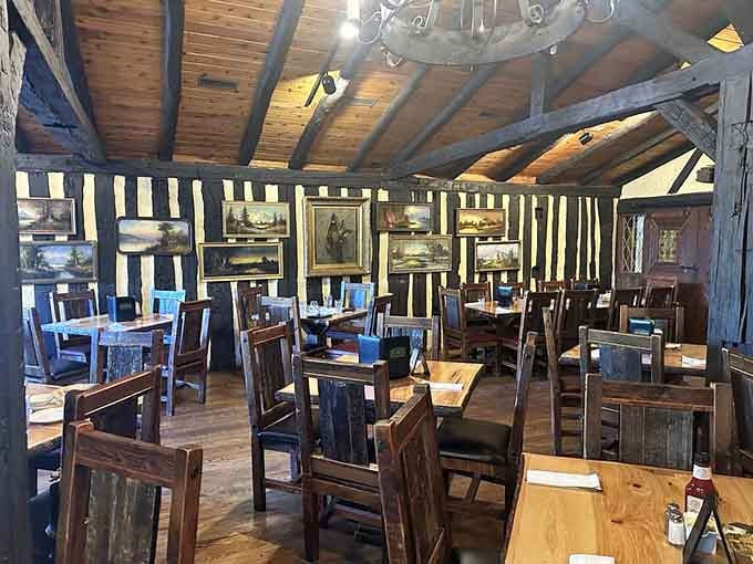 Exposed beams and rustic charm create an atmosphere where every meal feels like a medieval feast, minus the jousting.