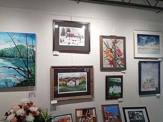 Local artwork adorns the walls, proving this museum celebrates the entire Canal Winchester community, not just barbering history.