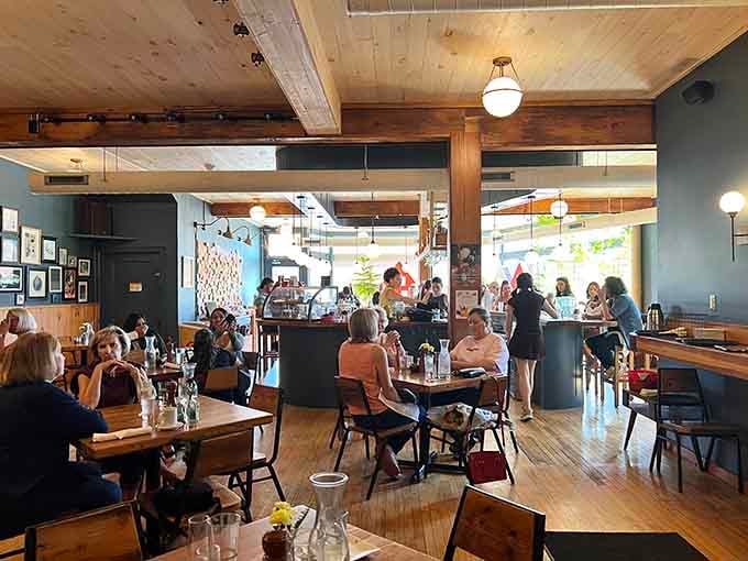 Natural light, warm wood, and happy diners create the kind of atmosphere where you'll want to cancel your afternoon plans.