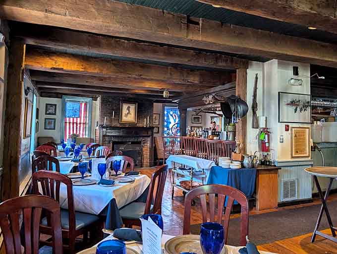 Those wooden beams overhead aren't from a decorator's catalog; they've been holding strong since the Revolutionary War era.