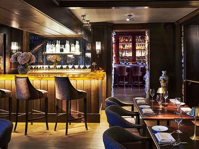 When historic charm meets modern sophistication, you get a bar that looks like it belongs in a movie about elegant living.