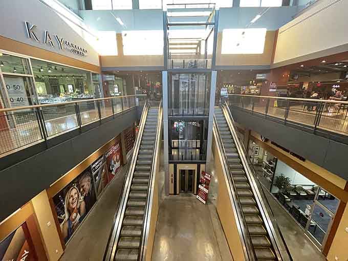 That glass elevator and those escalators make navigating between floors feel fancier than your average shopping trip deserves.