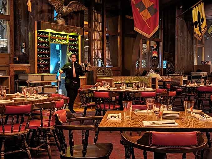 Medieval banners and dark wood create an atmosphere where every meal feels like a feast fit for kings.