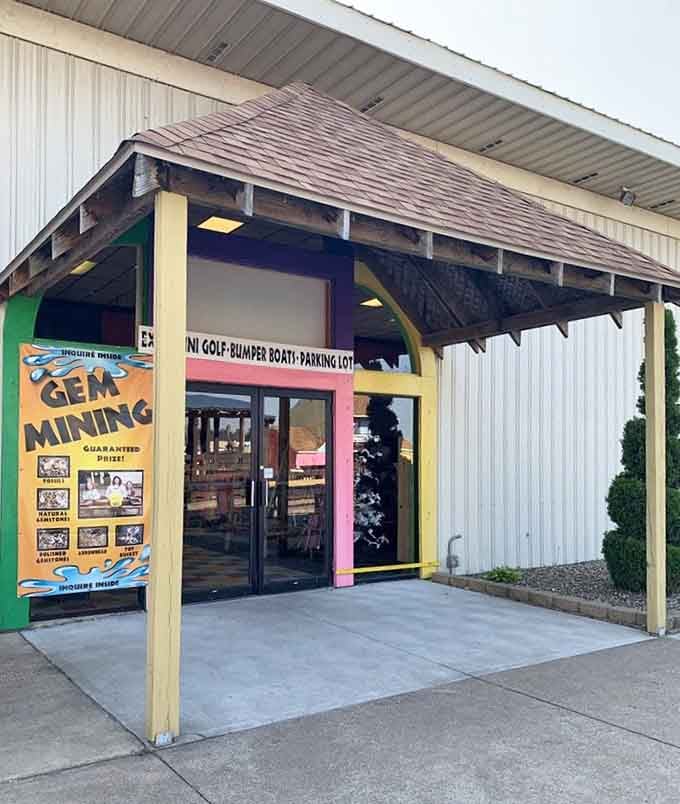 The entrance promises adventure beyond those doors, where mini golf, gem mining, and bumper boats await your arrival.