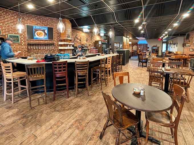 Exposed brick, warm lighting, and a full bar create the perfect atmosphere for your morning feast.