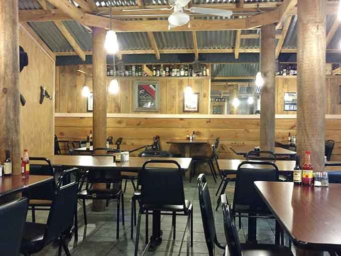 Exposed beams and honest wooden tables create the kind of atmosphere where good conversations happen over great steaks.