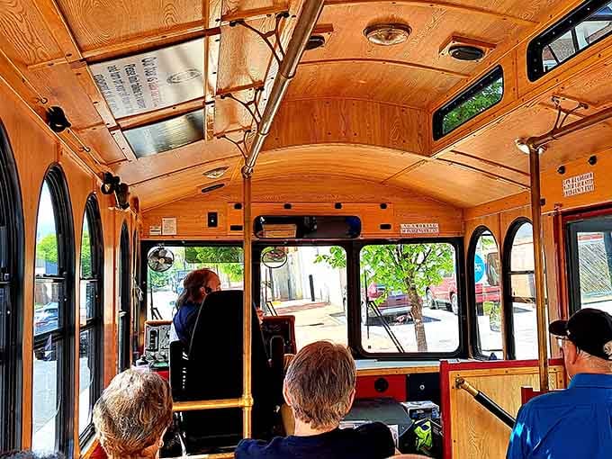 Inside, warm wood paneling and those classic arched windows create an atmosphere that's equal parts nostalgic charm and modern comfort.