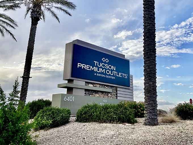 That sign isn't just pointing the way; it's practically begging you to come discover bargain bliss.