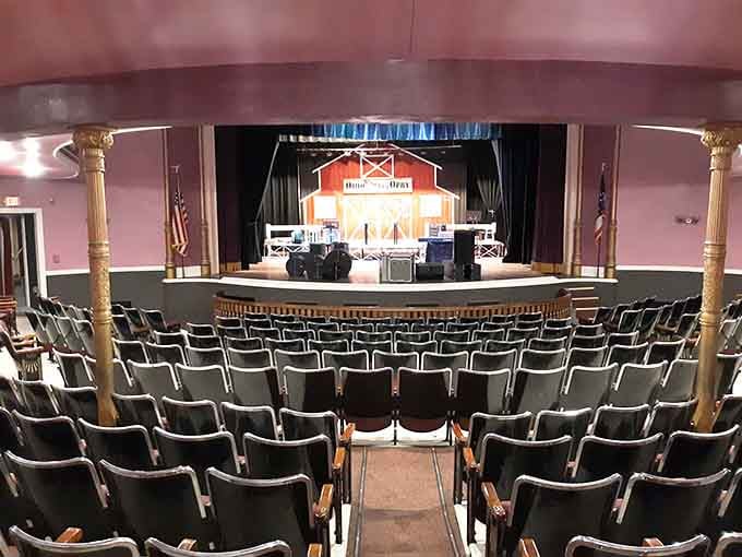 Pink walls and golden columns create an atmosphere where every seat feels like the best in the house.