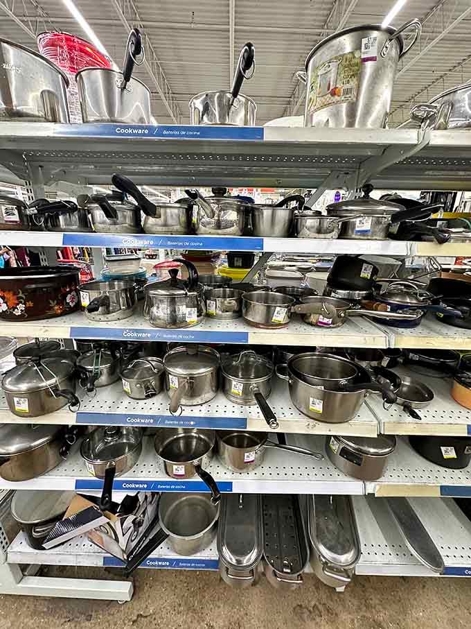 Rows of gleaming cookware waiting to transform your kitchen without transforming your bank account into dust.