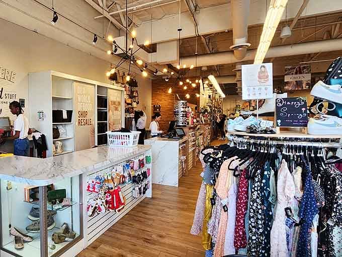 Wood accents and Edison bulbs in a resale shop? It's like HGTV met sustainable fashion and they're very happy together.
